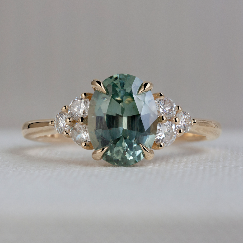 Montana Sapphire With Diamond Cluster Side Stones - Emily Chelsea